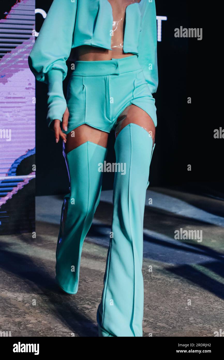 Fashion model woman wearing bright blue summer creative costume. Casual ...
