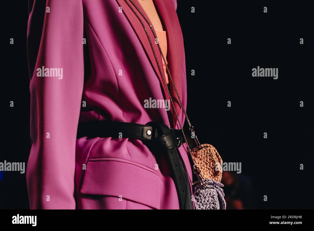 Fashionable details of fancy pink classy jacket on a female figure ...