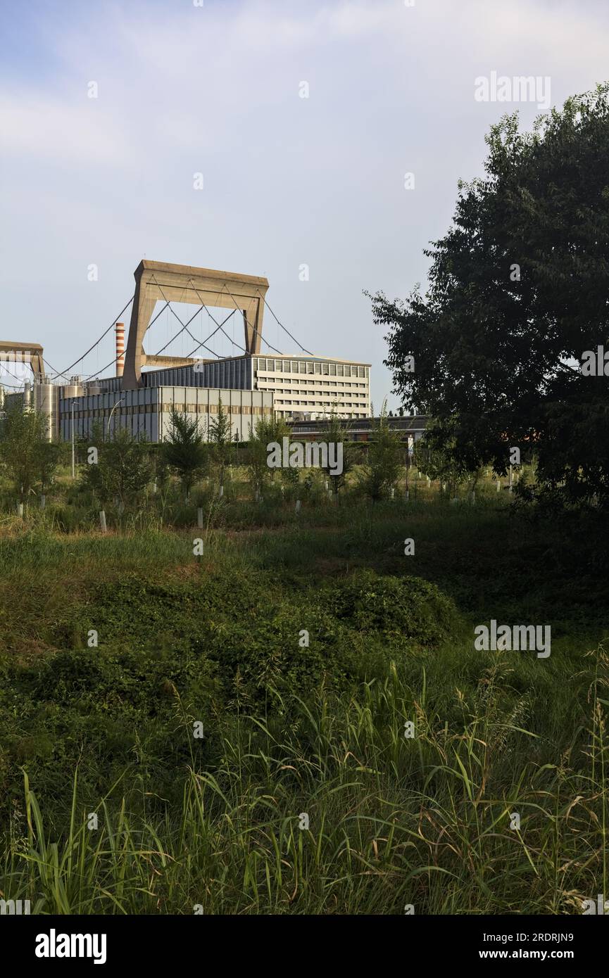 Industrial complex in the italian countryside at sunset seen from a ...