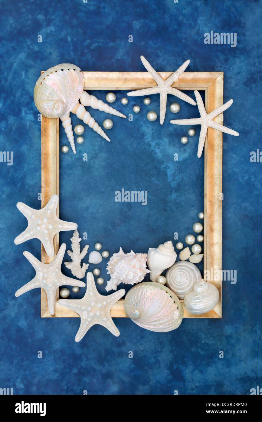 Oyster pearl and seashell abstract with white shells on mottled blue ...