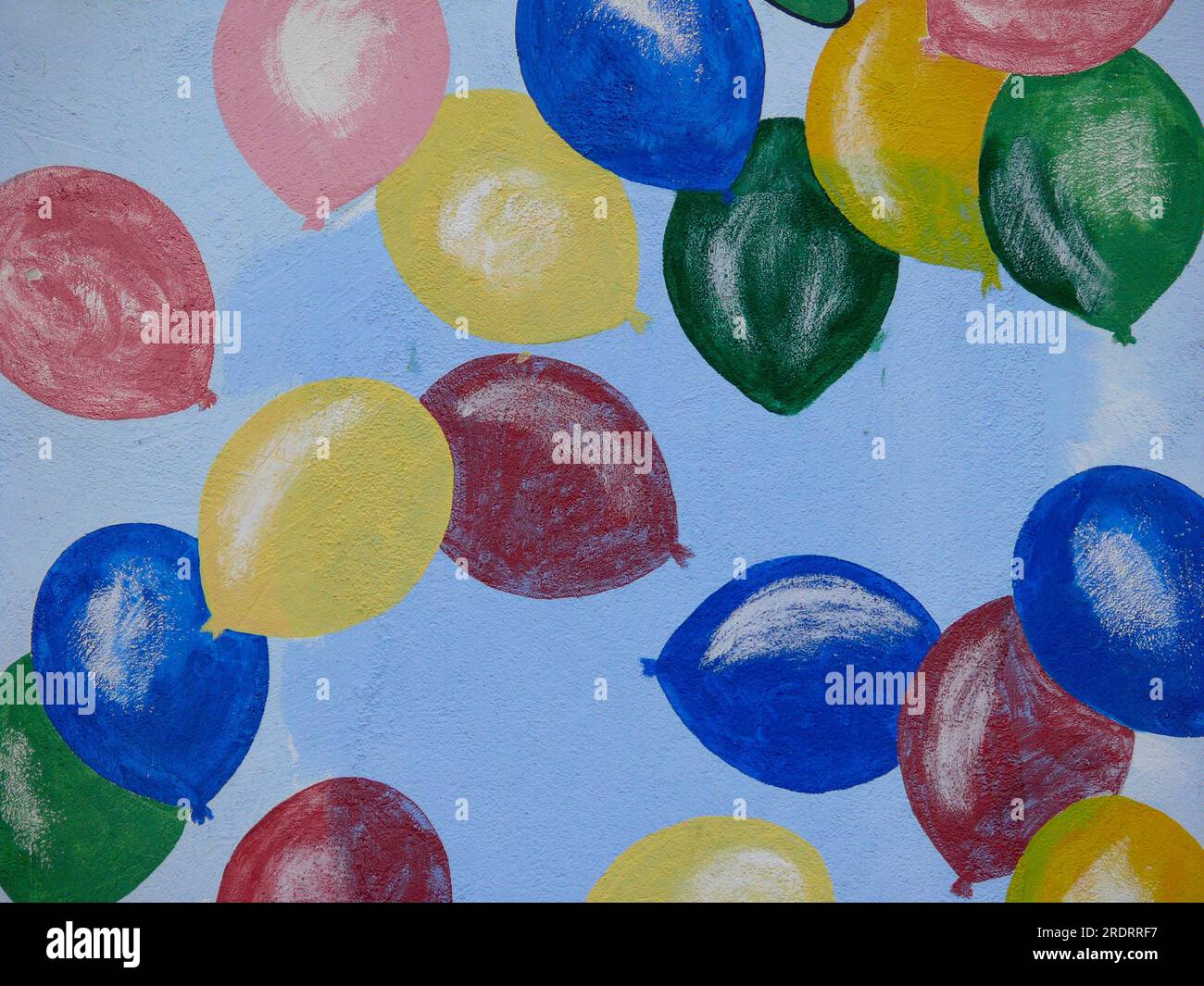 Painted balloons on house facade Stock Photo - Alamy