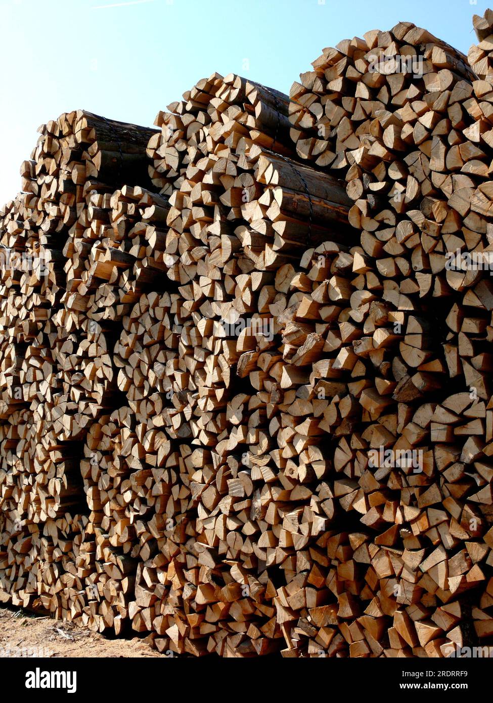 Firewood store, stacked firewood Wood store Stock Photo - Alamy