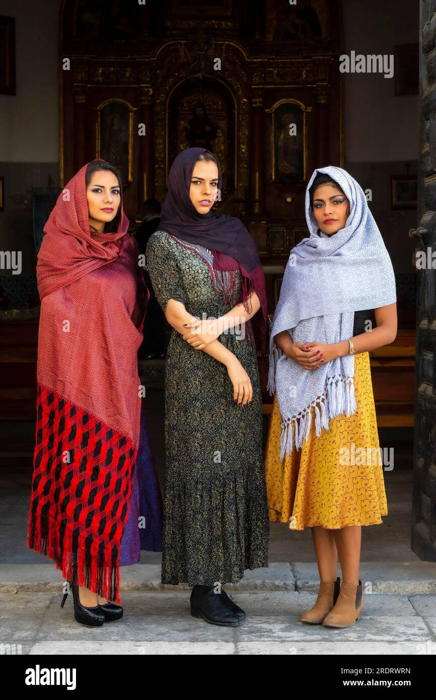 Three gorgeous Hispanic Brunette models pose outdoors in a Catholic ...