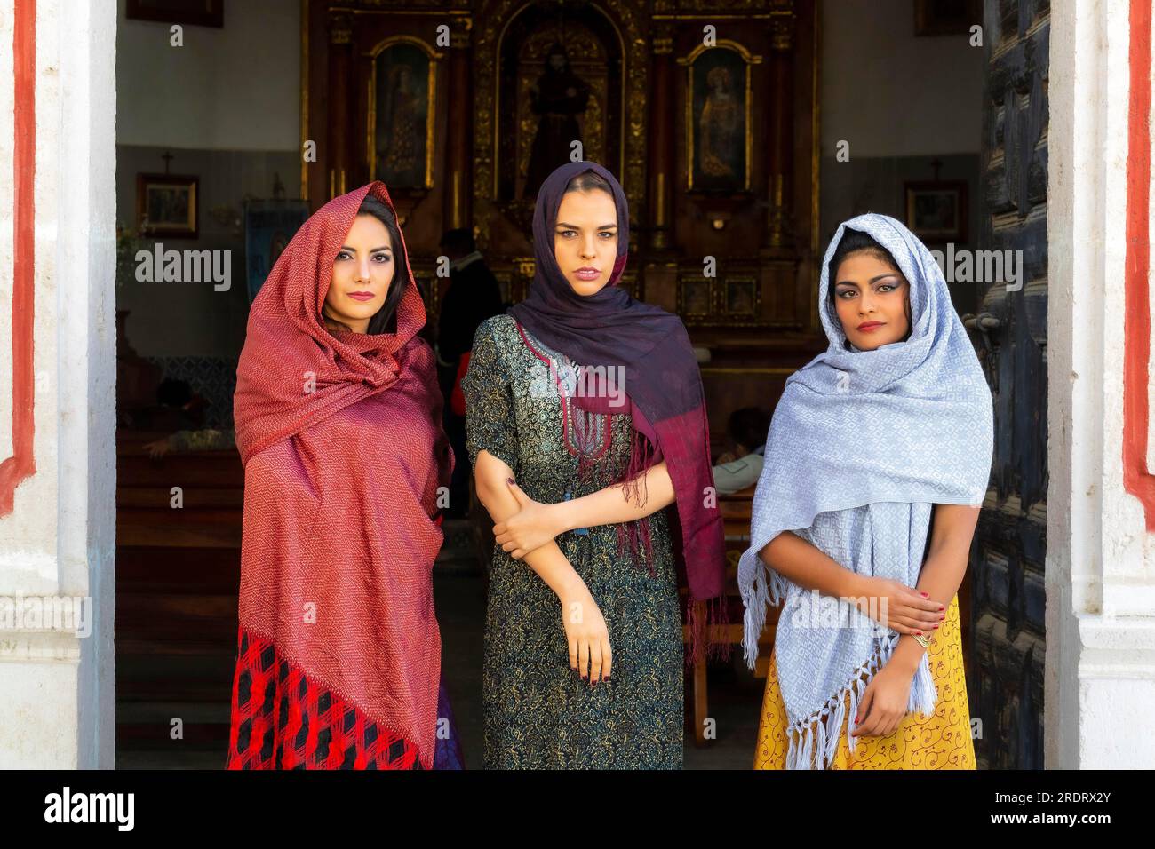 Three gorgeous Hispanic Brunette models pose outdoors in a Catholic ...