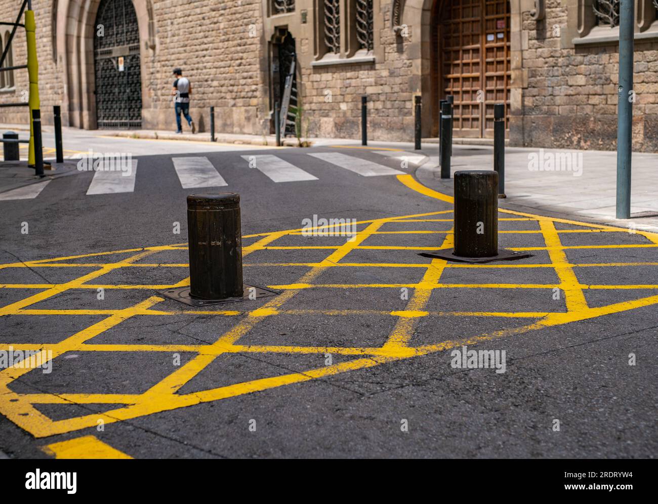 Italian city view with road and blocking posts Stock Photo - Alamy