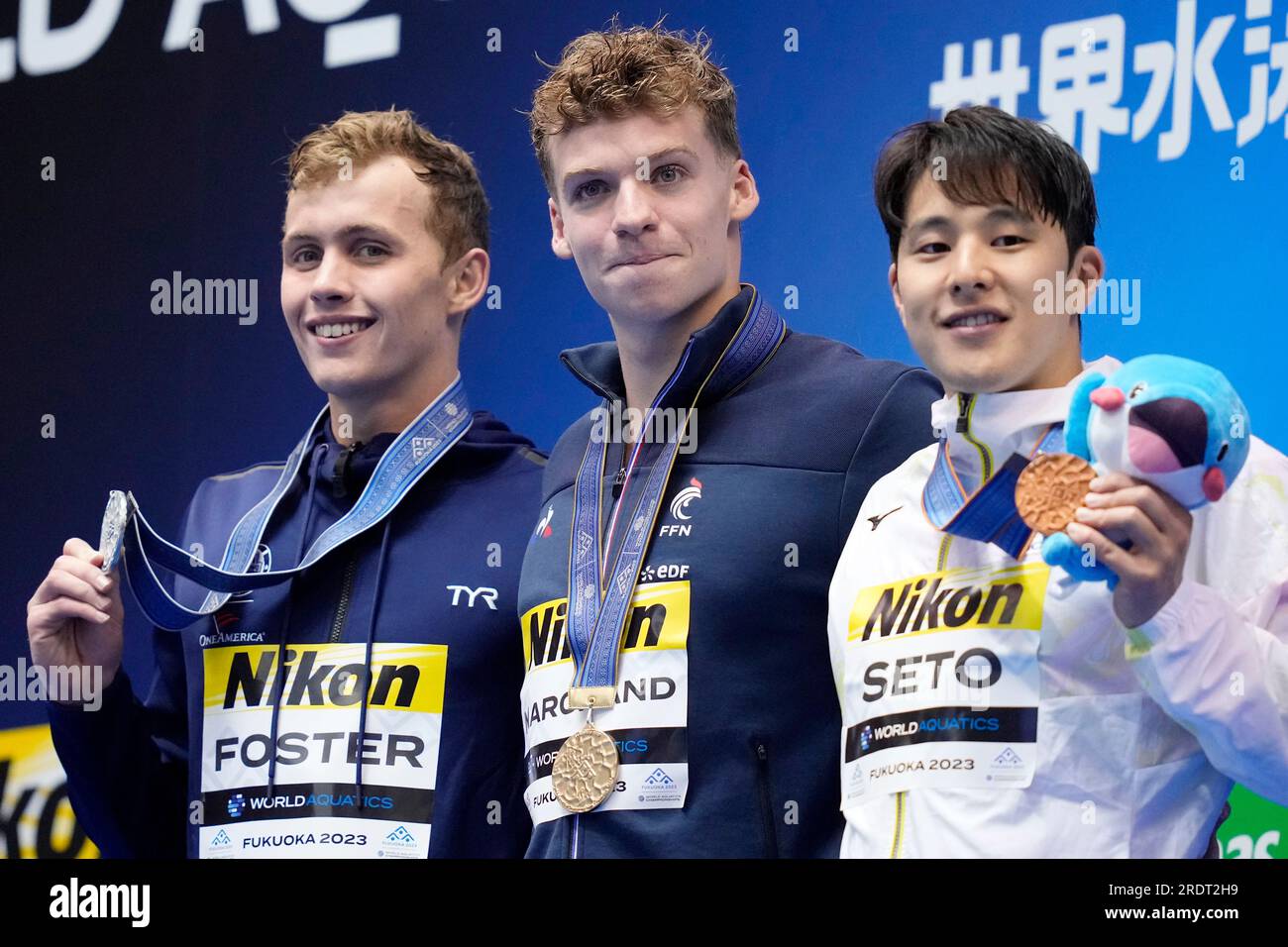 From left, silver medalist Carson Foster of the United States, gold ...