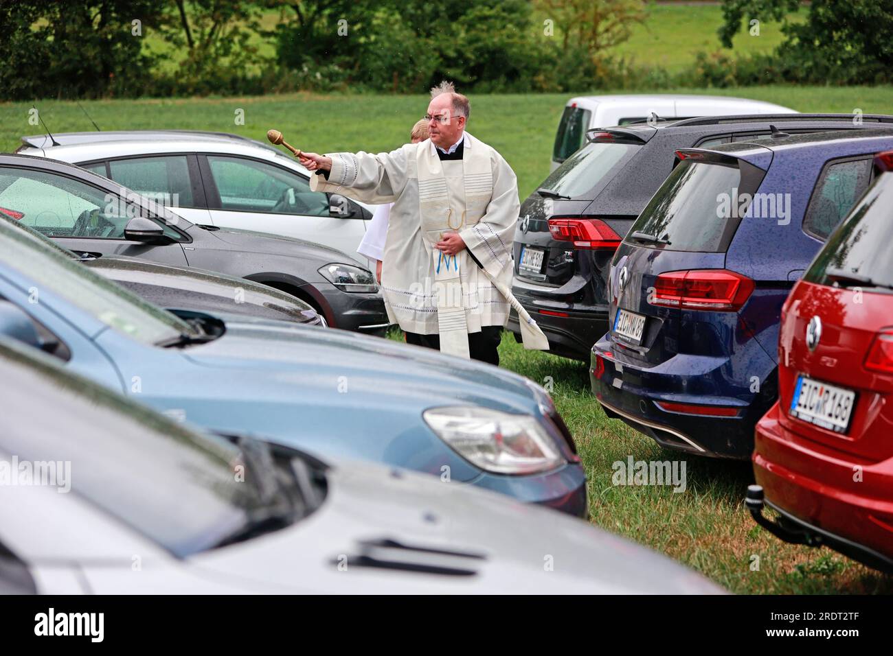 Steinbach, Germany. 23rd July, 2023. Father Andreas Kruse blesses the ...
