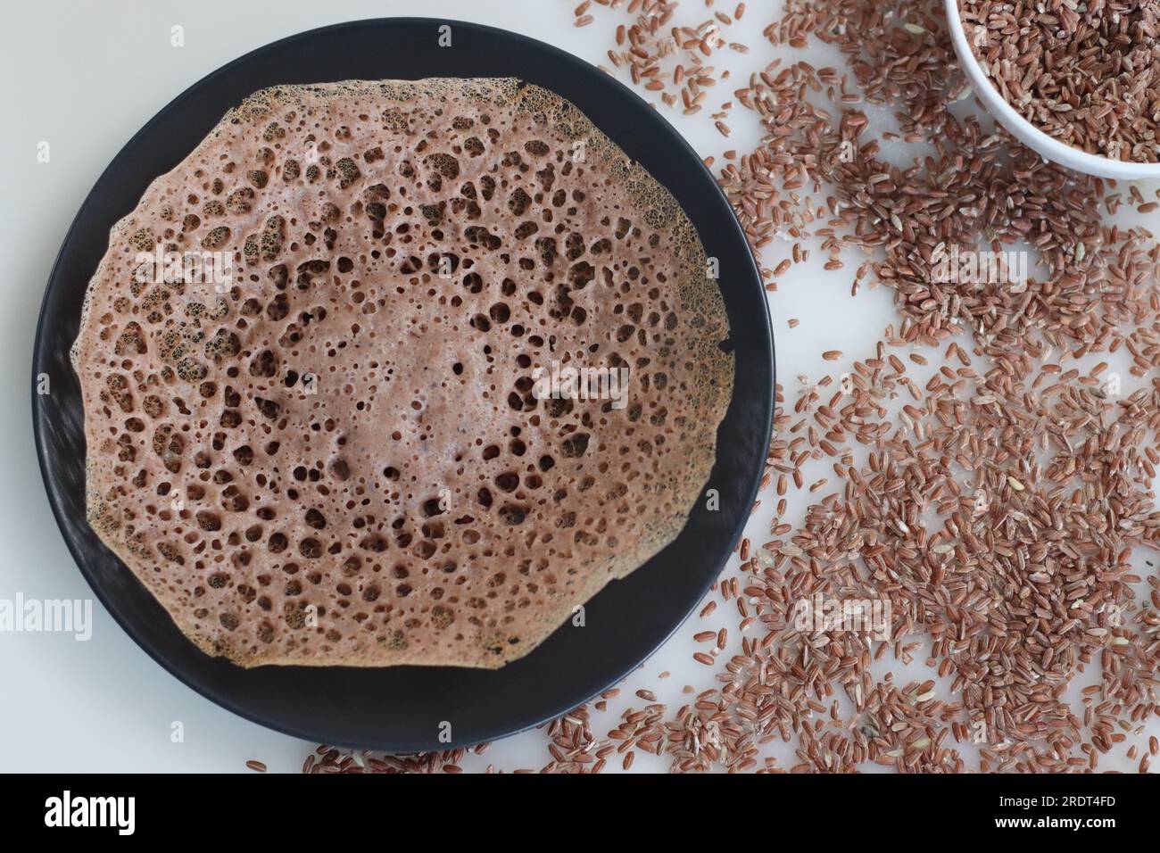 Laced navara rice Crepes or Navara rice appam. Fermented rice pancakes ...