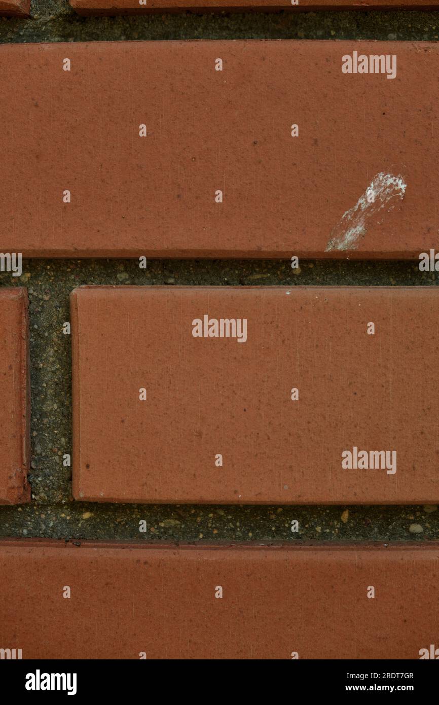 Red brick and brick edge from pillar in front of wall as texture ...