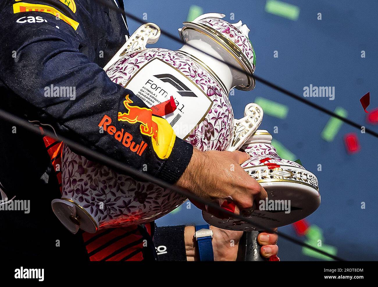 BUDAPEST - Max Verstappen (Red Bull Racing) on the podium with his broken trophy after winning ...