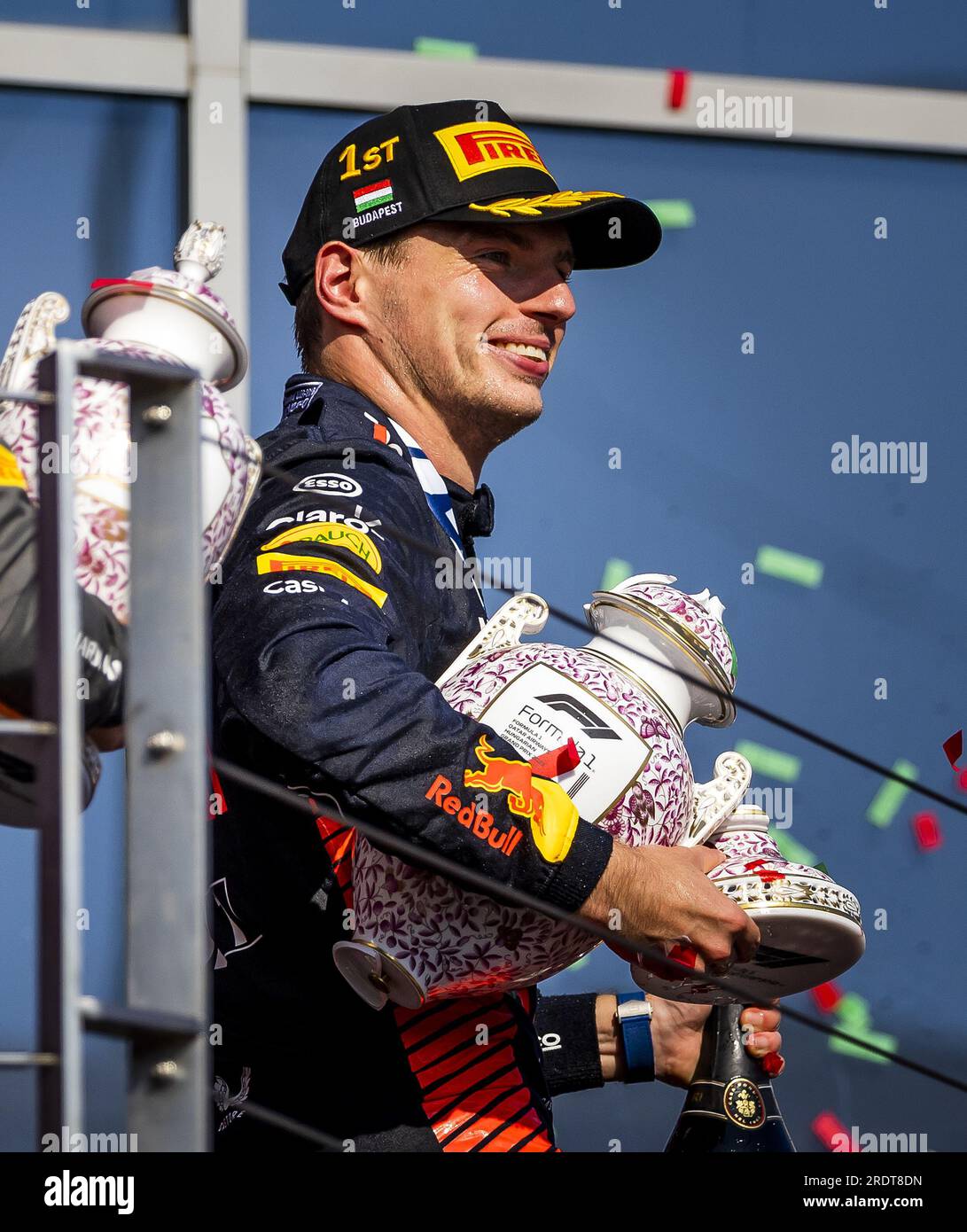 BUDAPEST - Max Verstappen (Red Bull Racing) on the podium with his broken trophy after winning ...