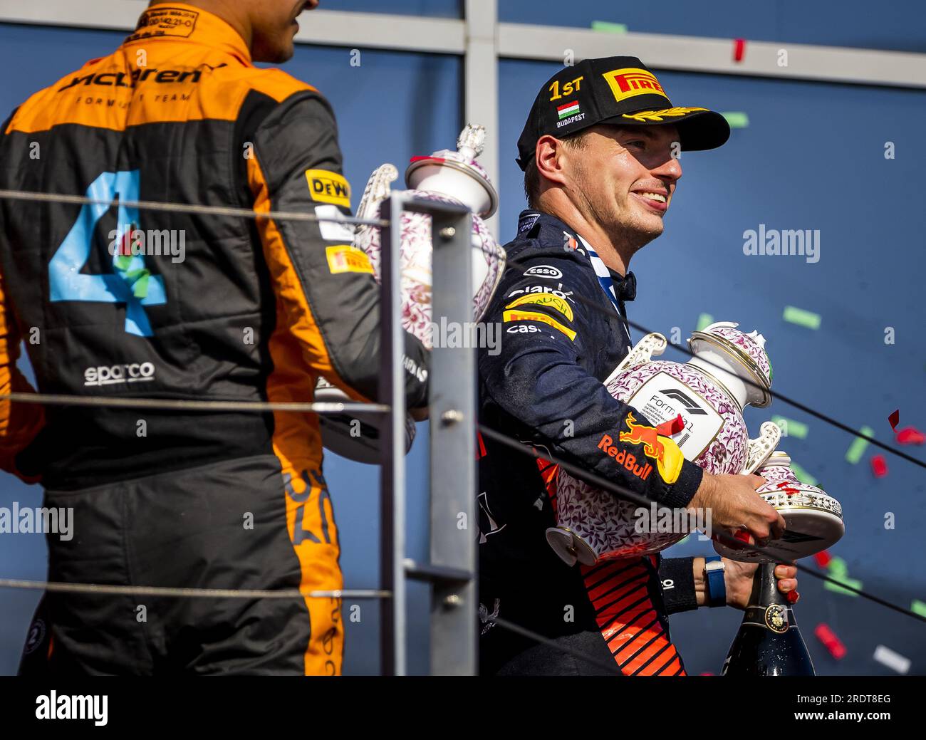 BUDAPEST - Max Verstappen (Red Bull Racing) on the podium with his broken trophy after winning ...