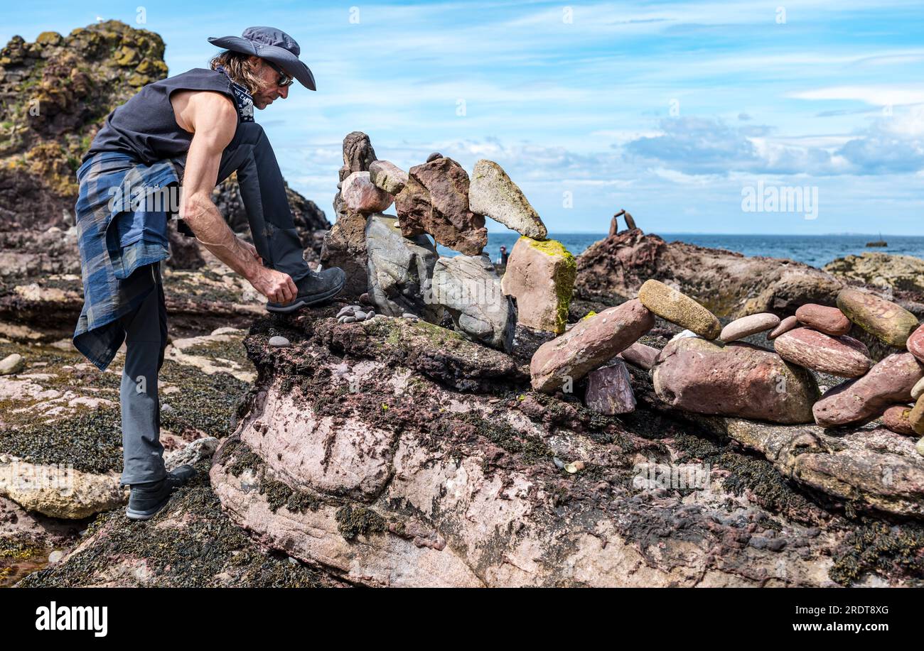 Pedro Duran creating stone balance, European Stone Stacking ...