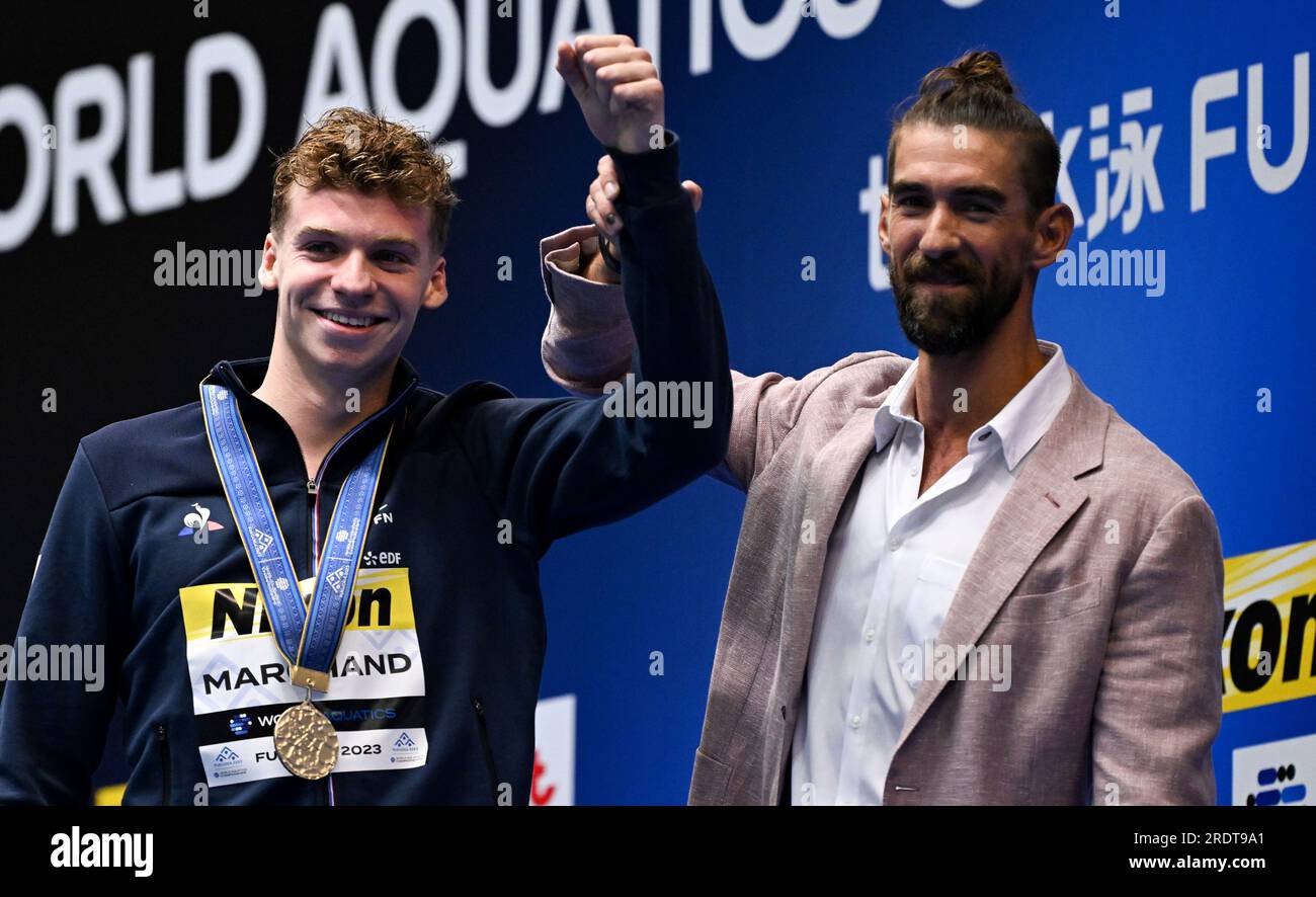 Leon marchand of france and michael phelps hi-res stock photography and ...
