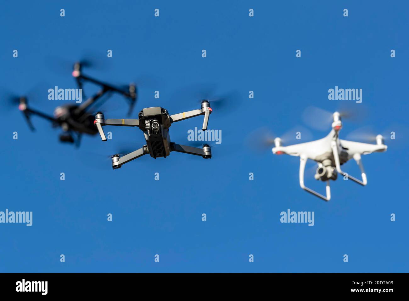 Group drones in blue hi-res stock photography and images - Alamy