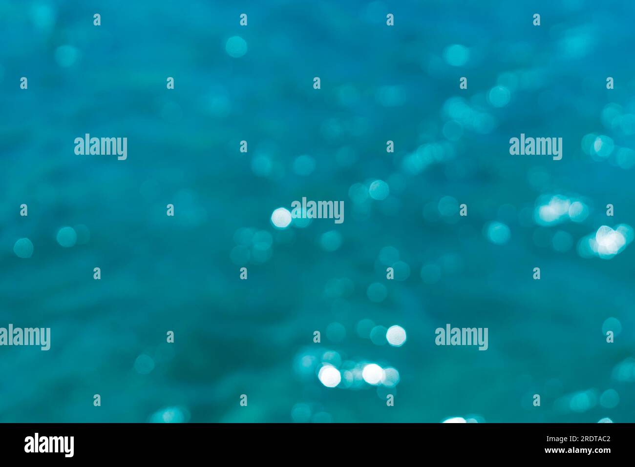 Blurry reflections on ocean surface for backgrounds Stock Photo - Alamy