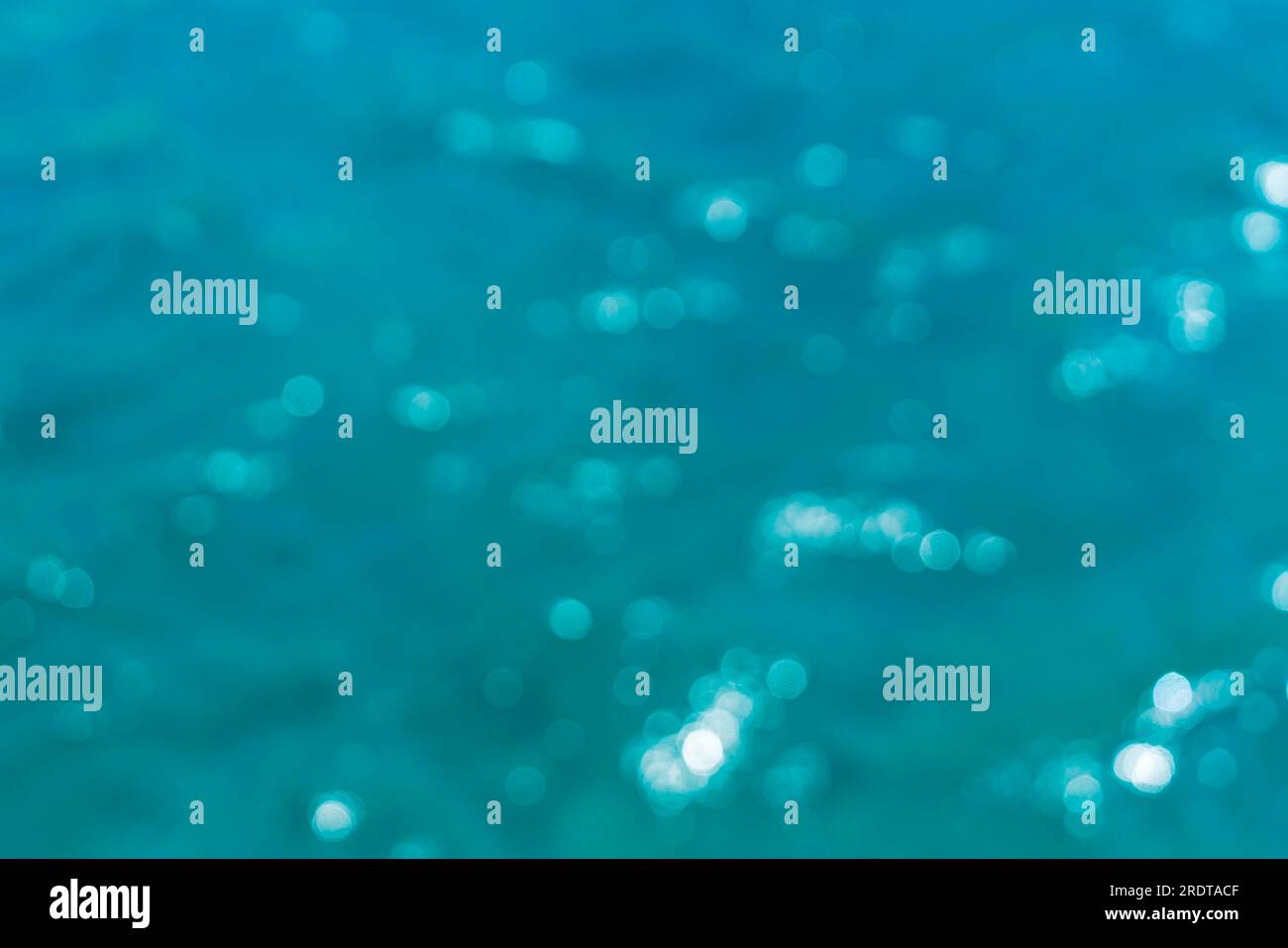 Blurry reflections on ocean surface for backgrounds Stock Photo - Alamy