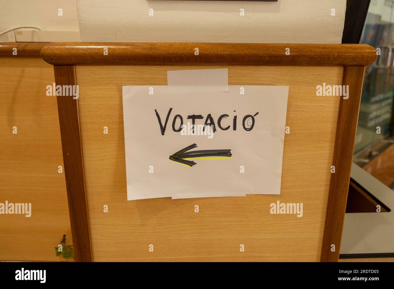 A sign indicating where to vote is seen at a polling station. At 9:00 a ...