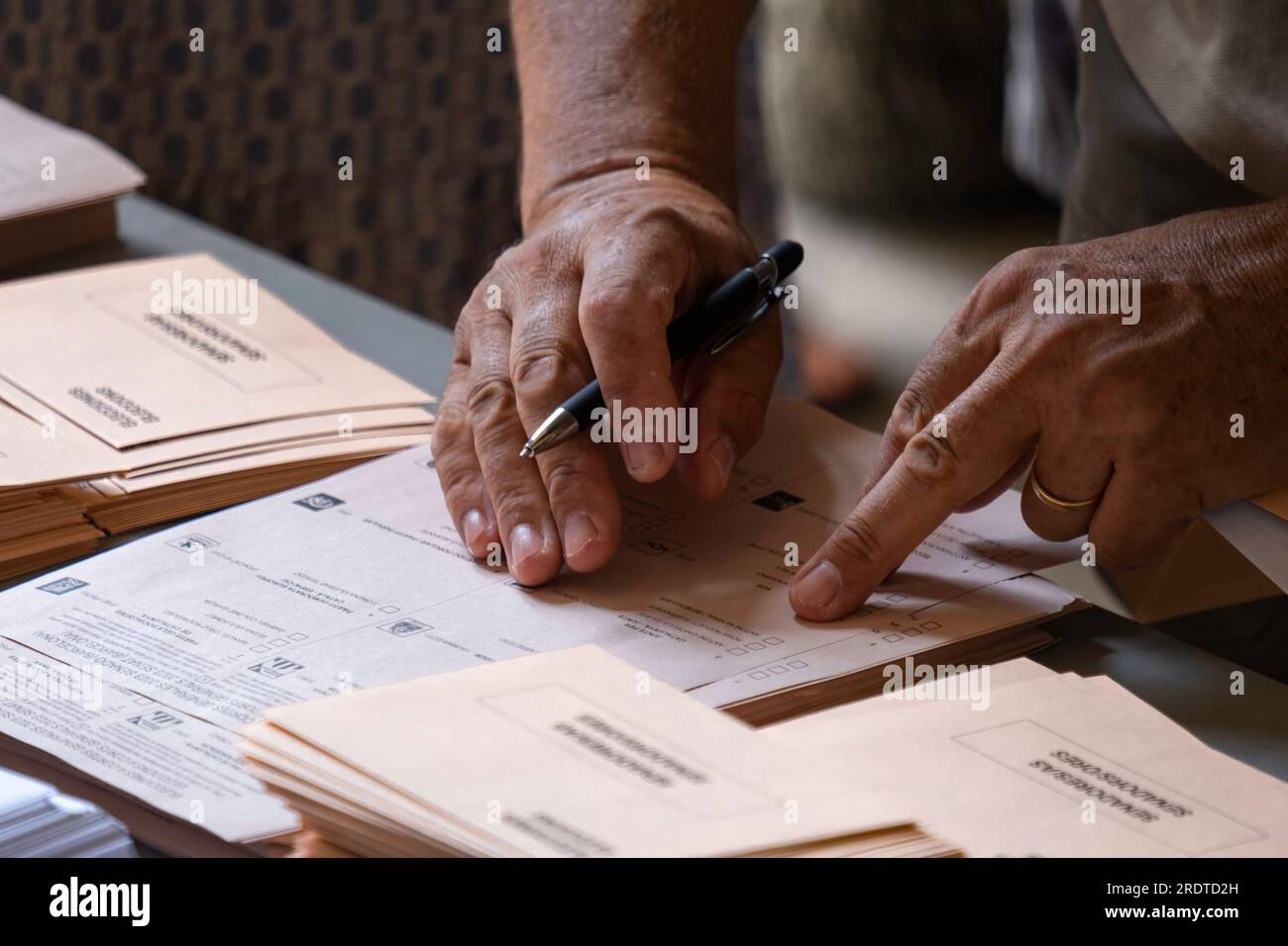 A voter is seen filling out the senators ballot. At 9:00 a.m. the ...
