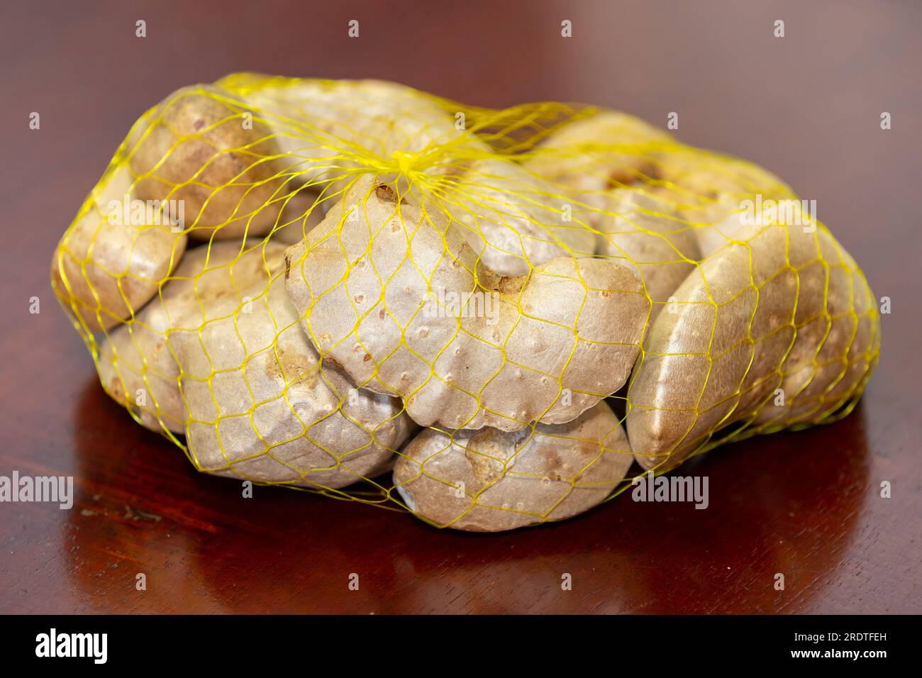 Edible bulb of the plant (Dioscorea bulbifera) originally from Africa ...