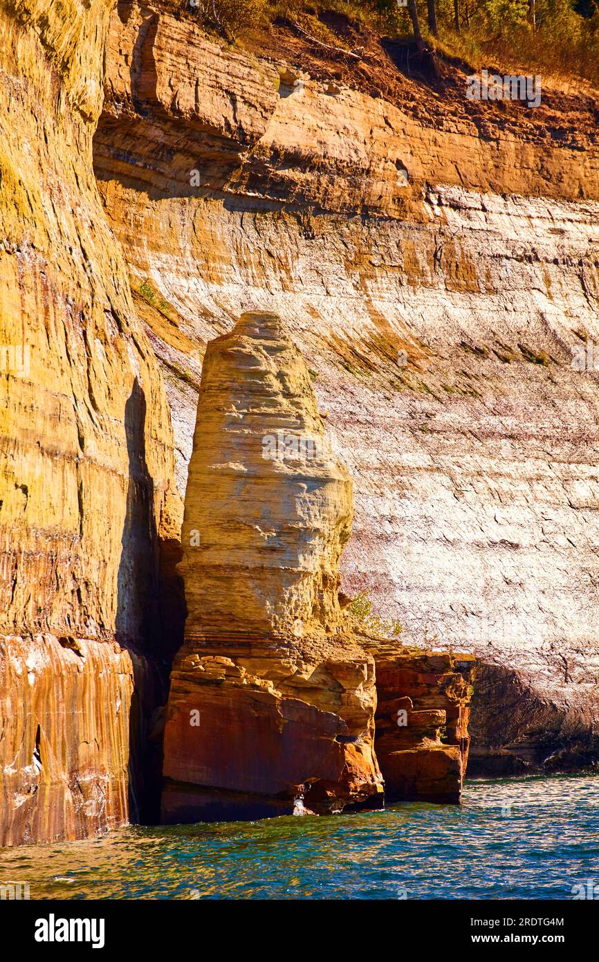 Water with Pictured Rocks of gold and white in Lake Superior Michigan ...