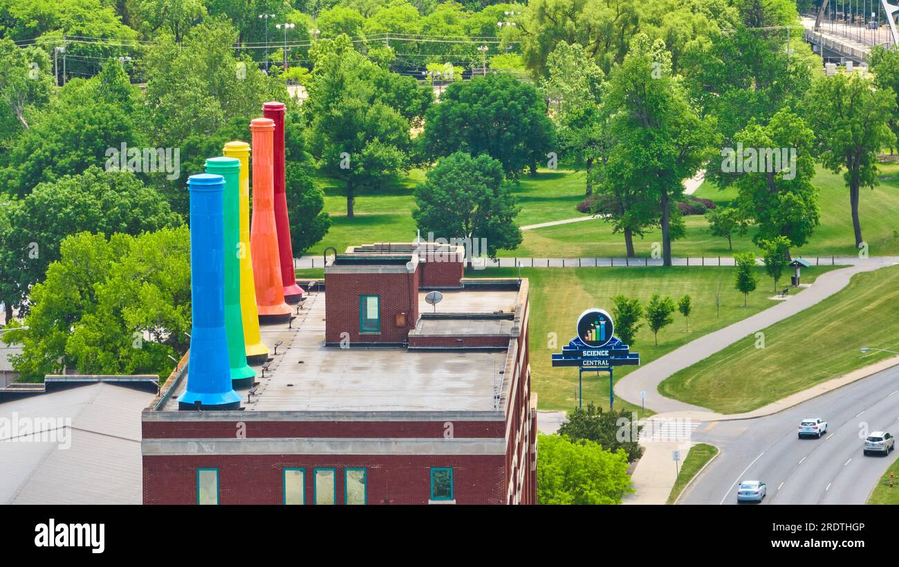 Science Central entrance sign with painted rainbow smokestacks on room ...