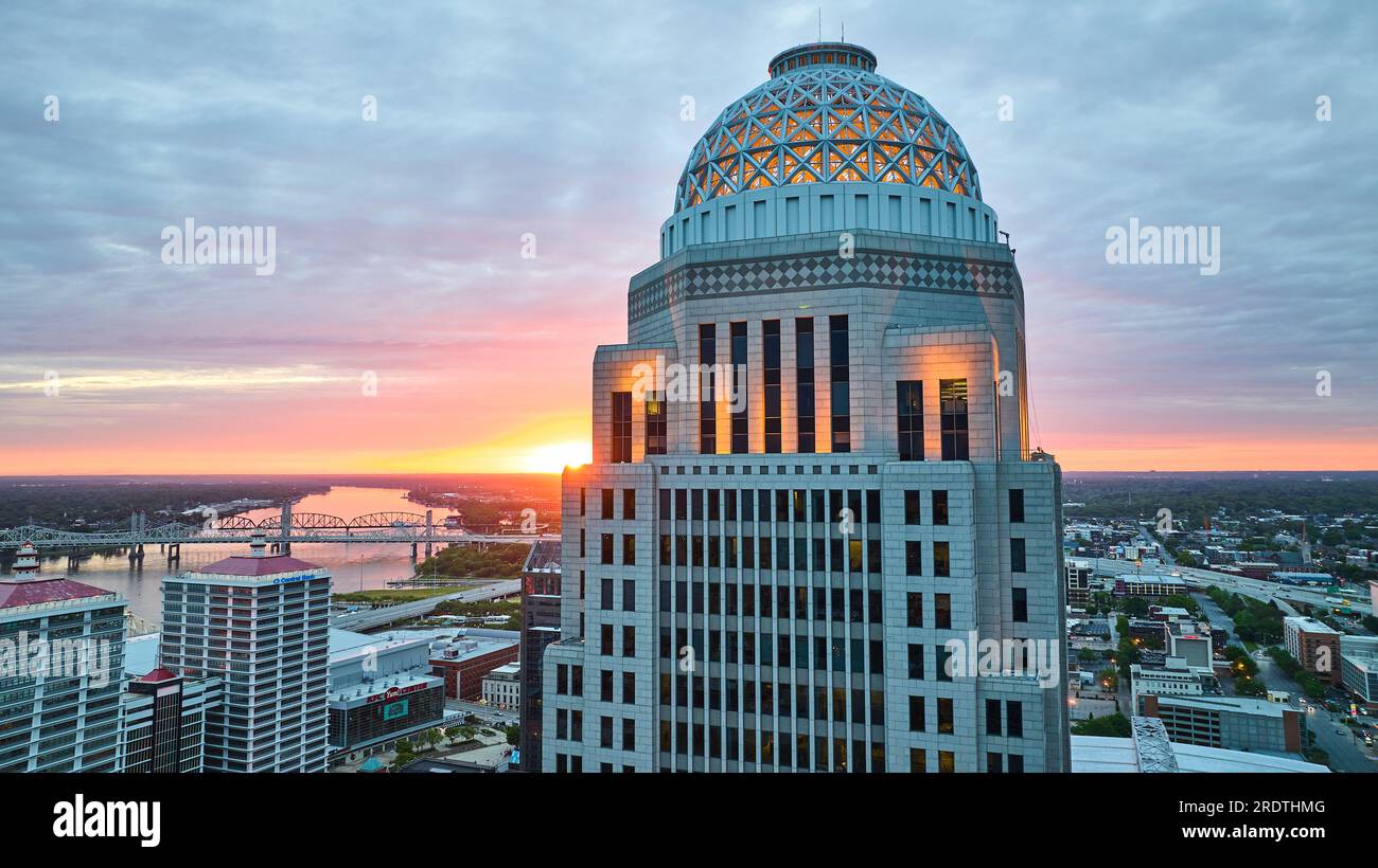 Sun poking behind main downtown Louisville Kentucky building aerial ...