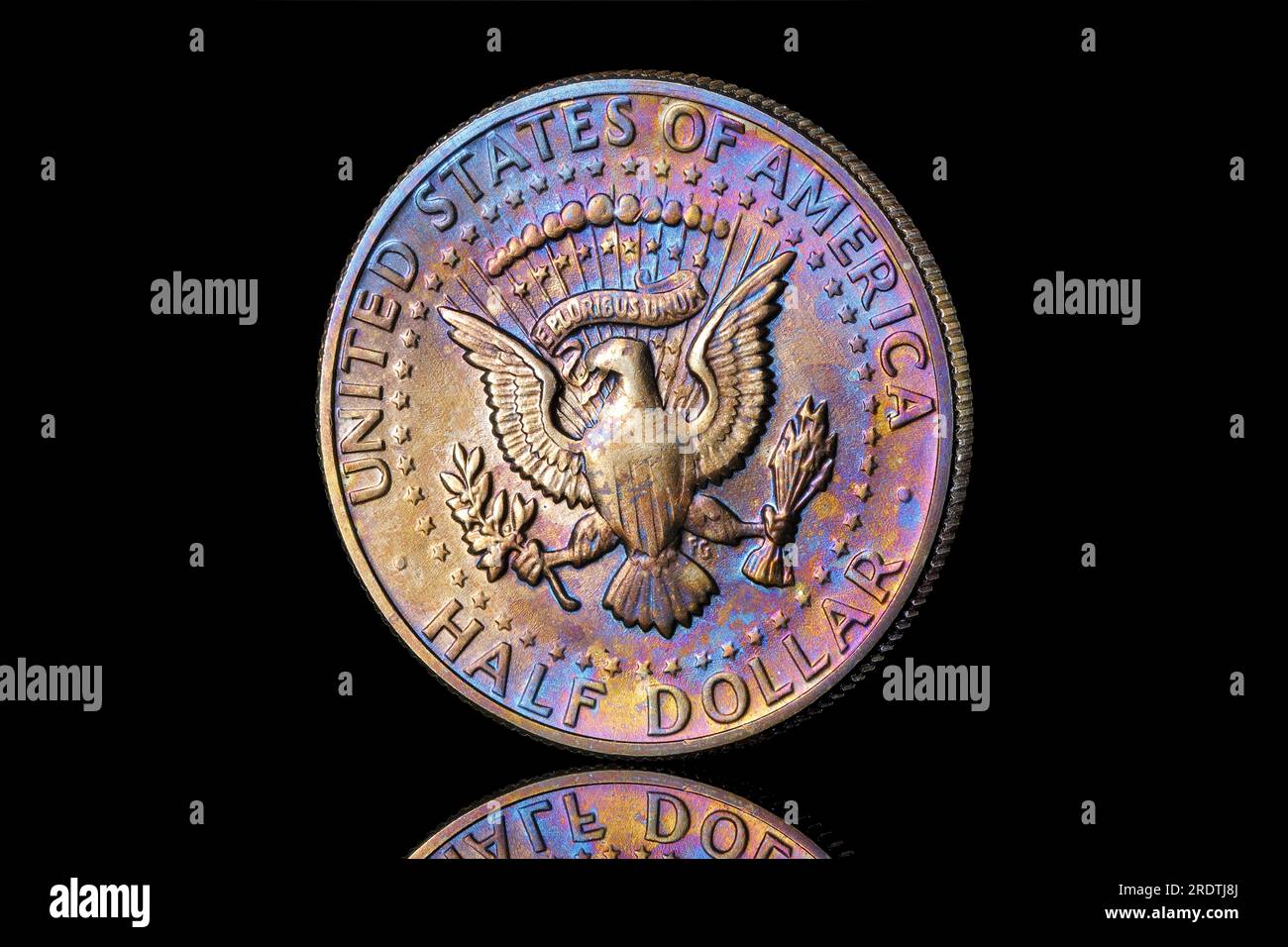 1971 US Half Dollar with rainbow toning. The obverse features a ...