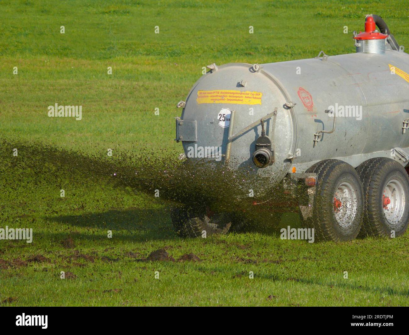 Tractor and slurry tanker, slurry tanker Stock Photo - Alamy