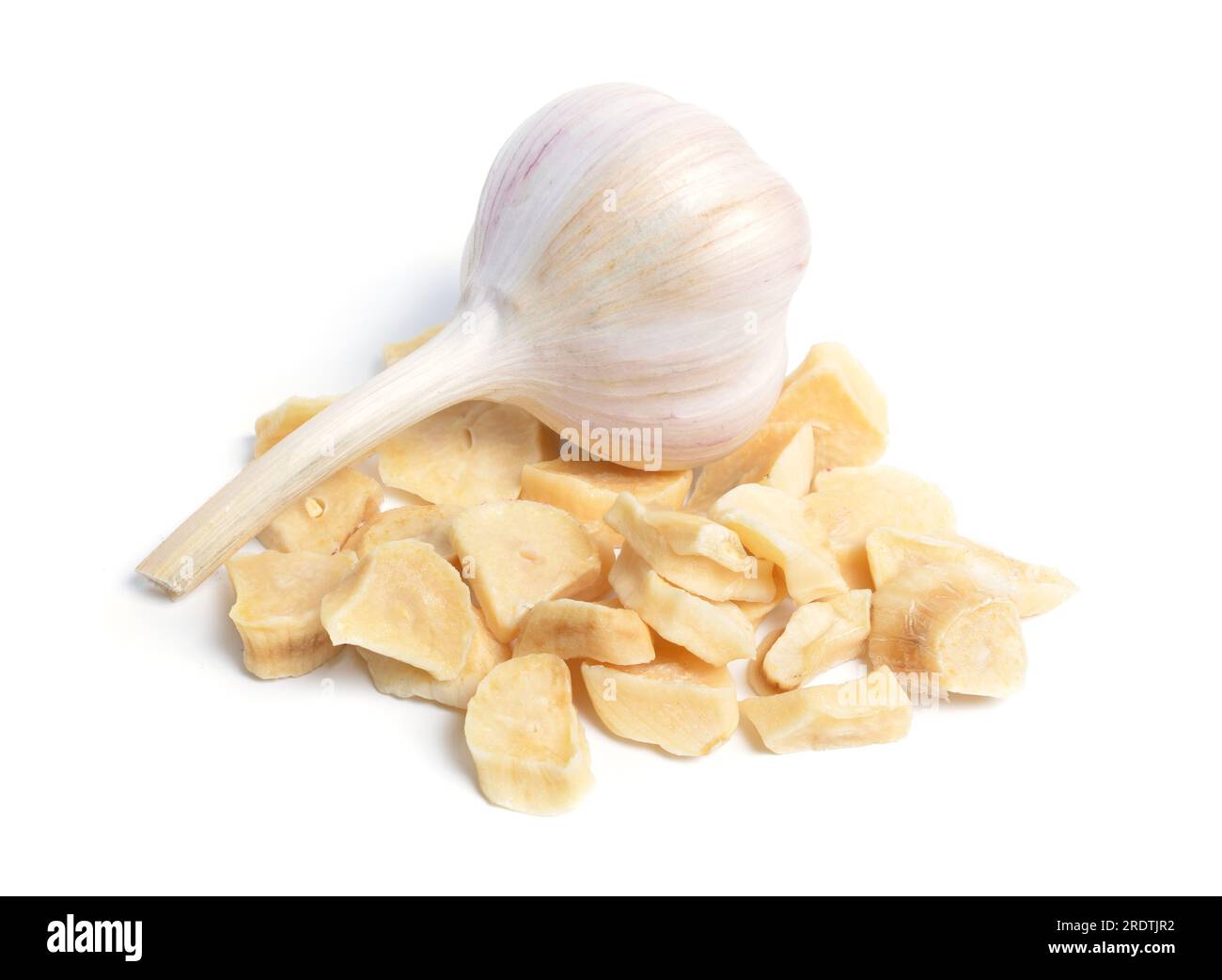 Dried garlic slices isolated on white background Stock Photo - Alamy