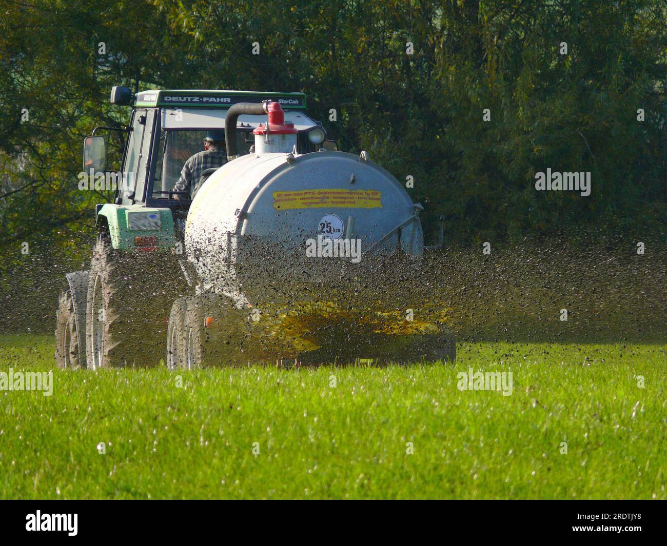Tractor and slurry tanker, slurry tanker Stock Photo - Alamy