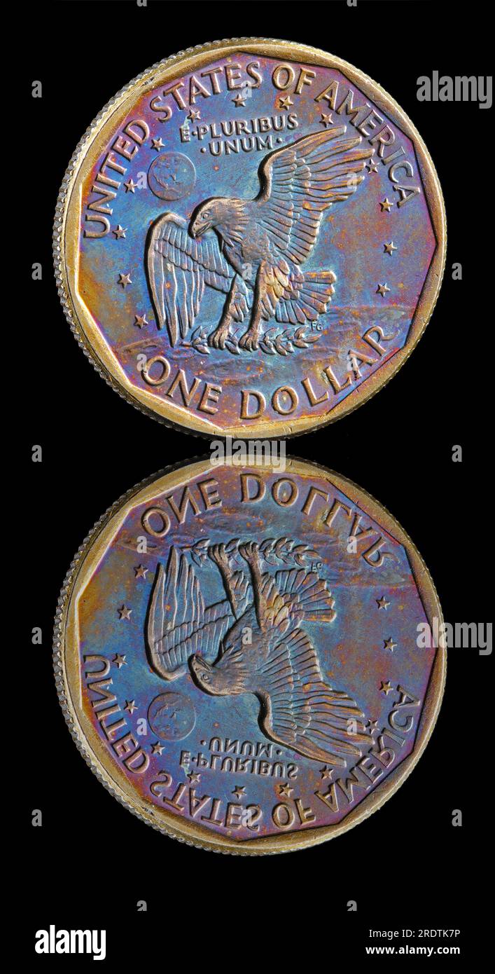 1979 One Dollar coin with rainbow toning. The design is that of the ...