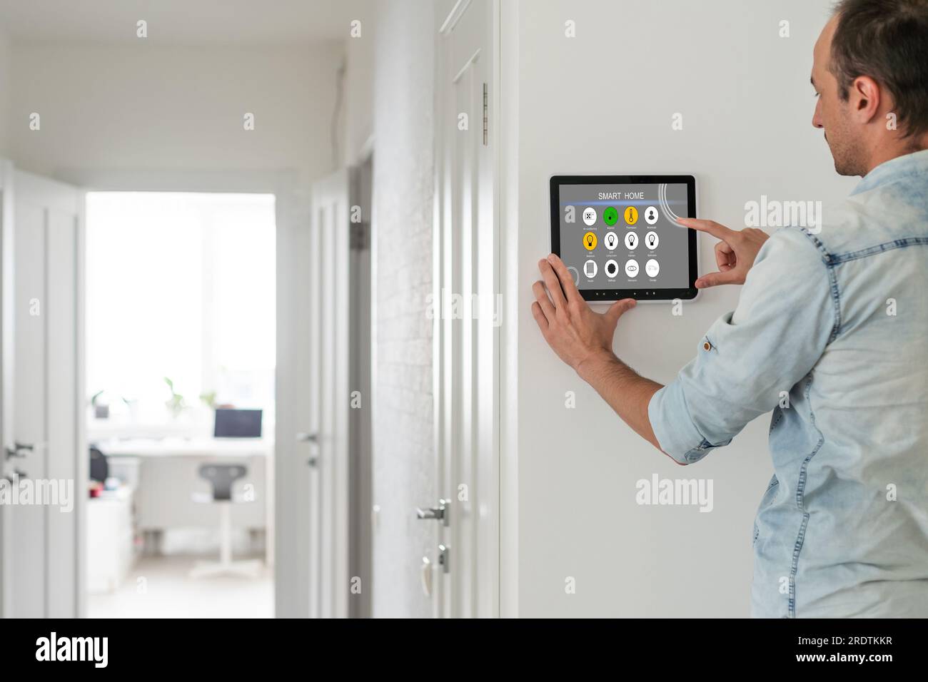 manipulating air conditioner with tablet Stock Photo - Alamy