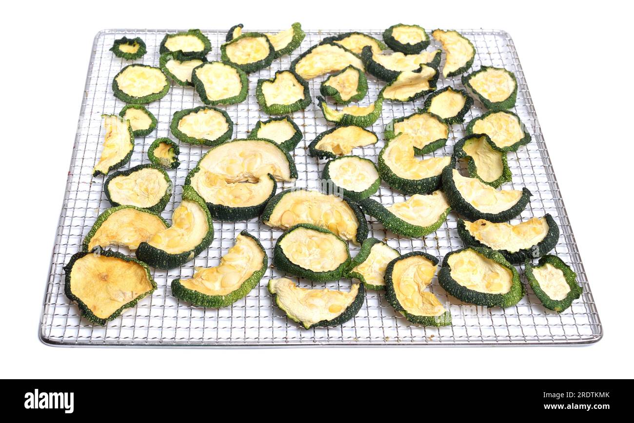 Dried zucchini slices isolated on white background Stock Photo - Alamy