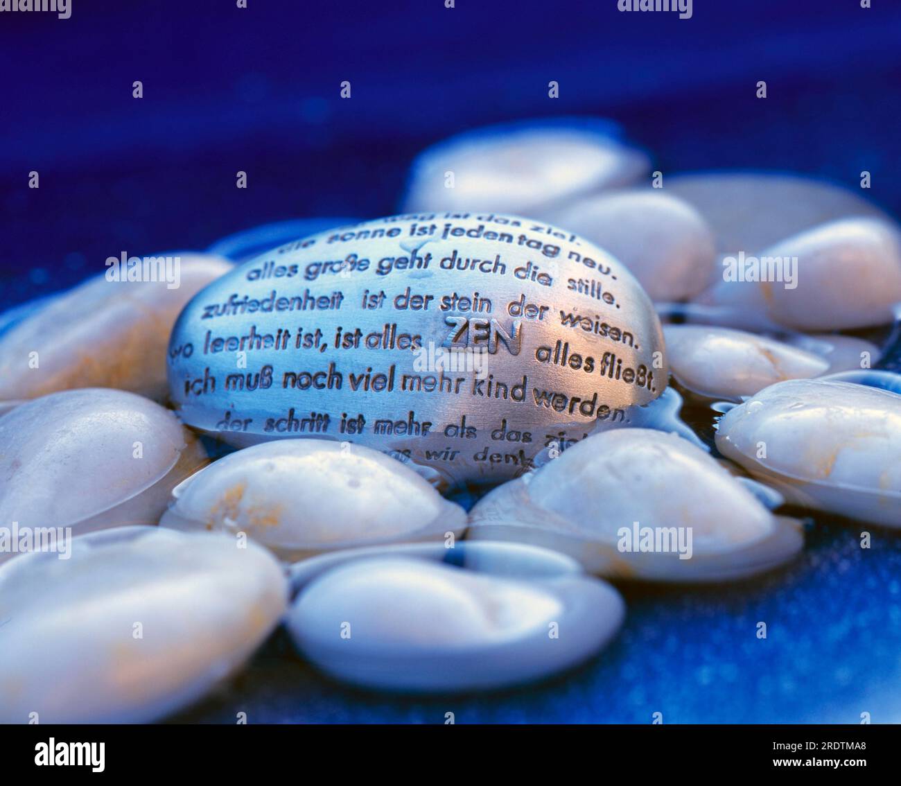 Poetry stone with ZEN inscriptions Stock Photo - Alamy