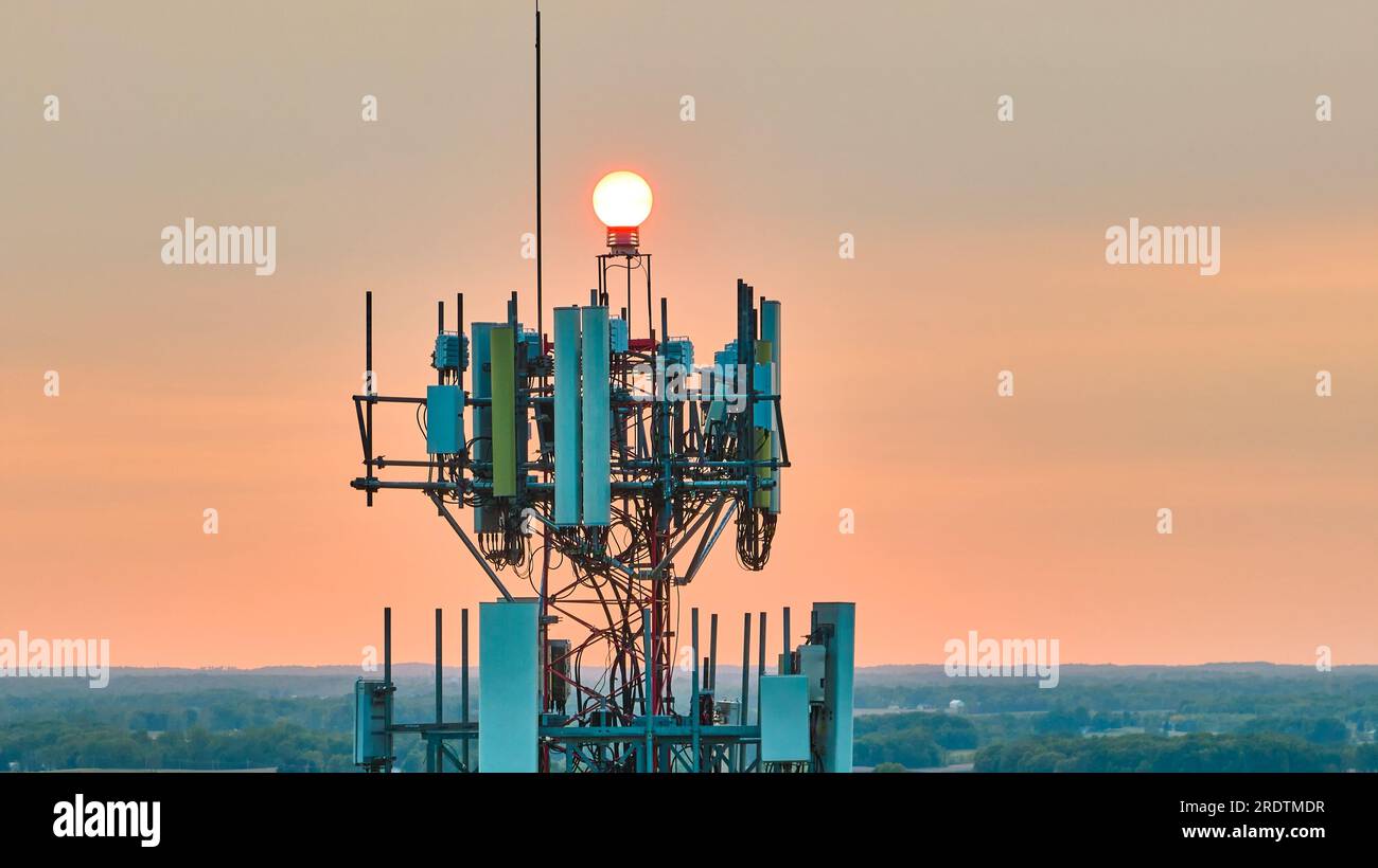Inspiration, sun as lightbulb, power coils, radio tower at sunset, star ...