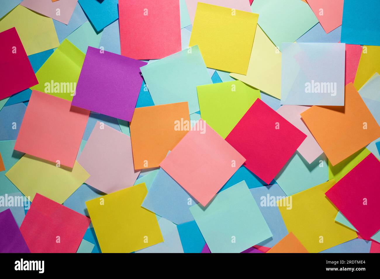 Large group of reminder notes on a table Stock Photo - Alamy