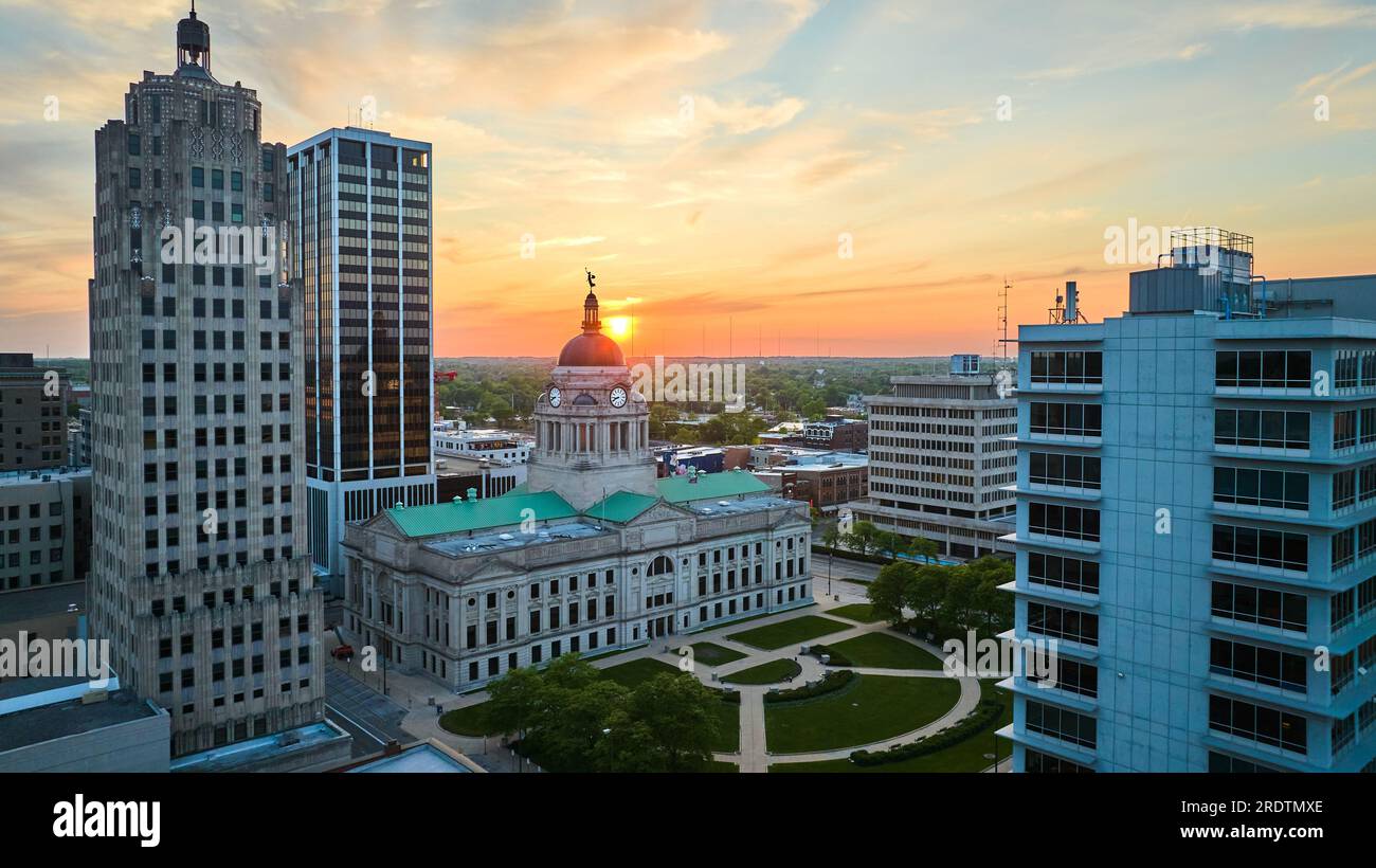 Golden sun in aerial shot of downtown PNC and Lincoln Bank Tower and ...