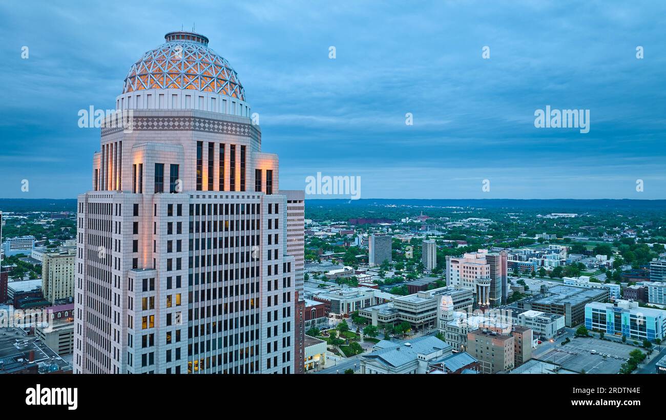 Downtown Louisville Kentucky skyscraper aerial dawn lights on dome ...