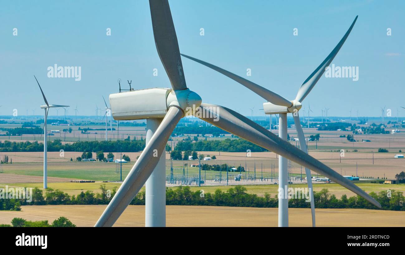 Aerial wind farm in farmland with close up of two wind turbines Stock ...