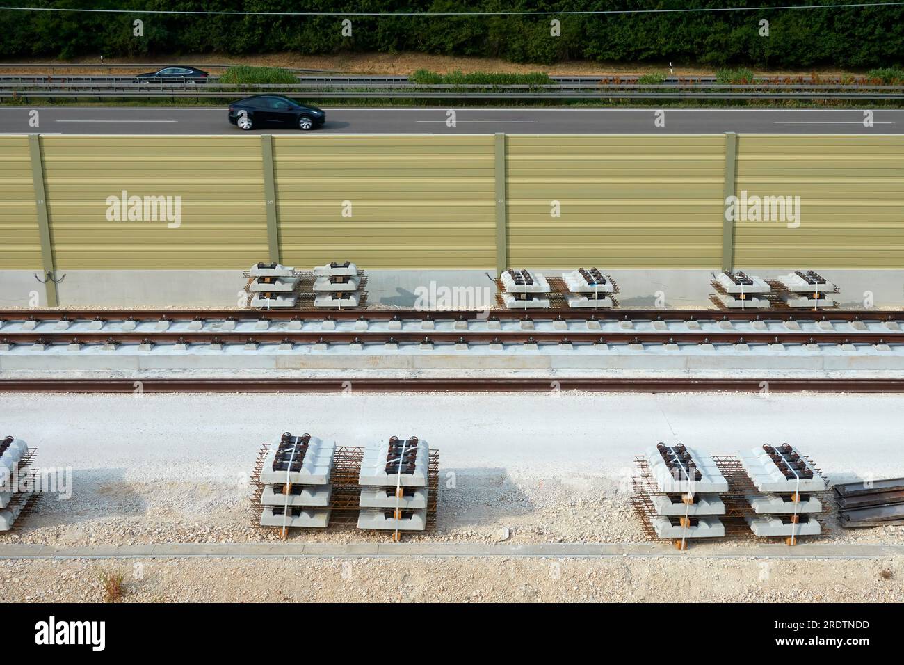 Laying of new railroad tracks. Steel construction materials and ...