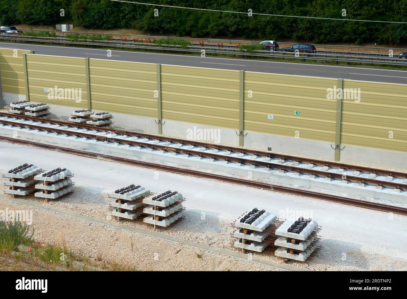 Laying of new railroad tracks. Steel construction materials and ...