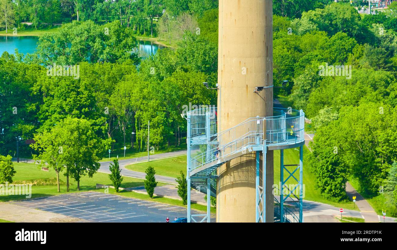 Aerial of top of blue metal spiral staircase up observation tower in ...