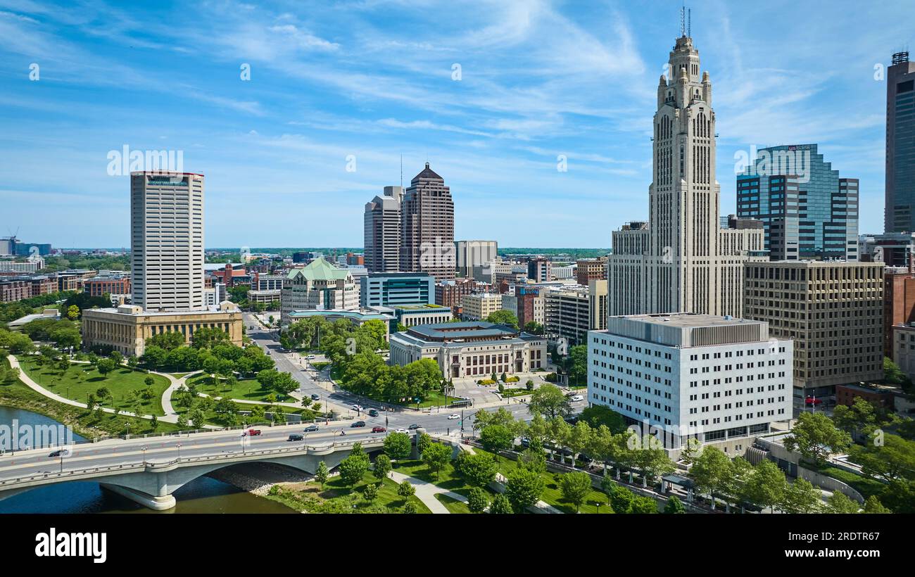 Aerial of green parks and sidewalks on outskirts of downtown Columbus ...
