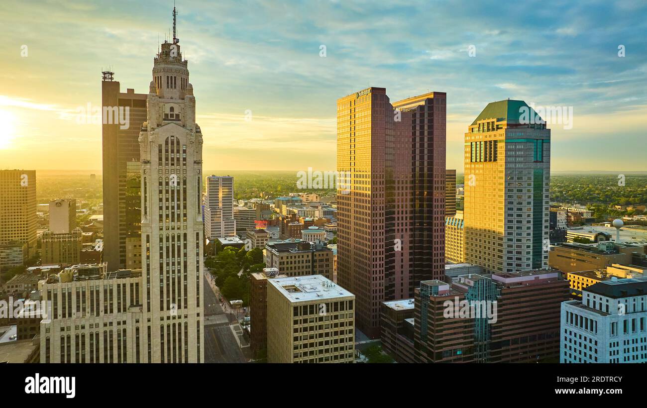 Golden sunrise lighting on sides of Huntington Tower Vern Riffe State ...