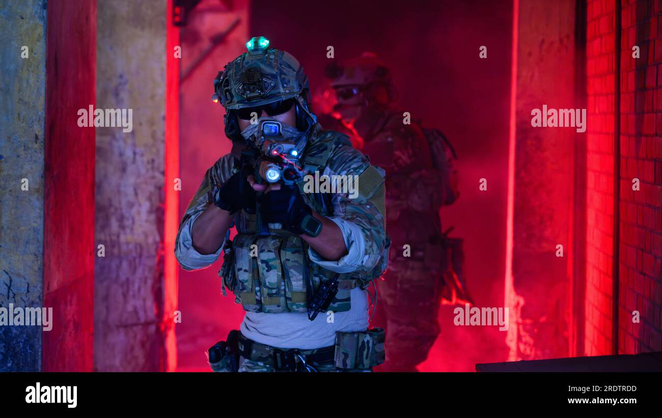 Expert team of soldiers attacking enemy during military operation, Army ...