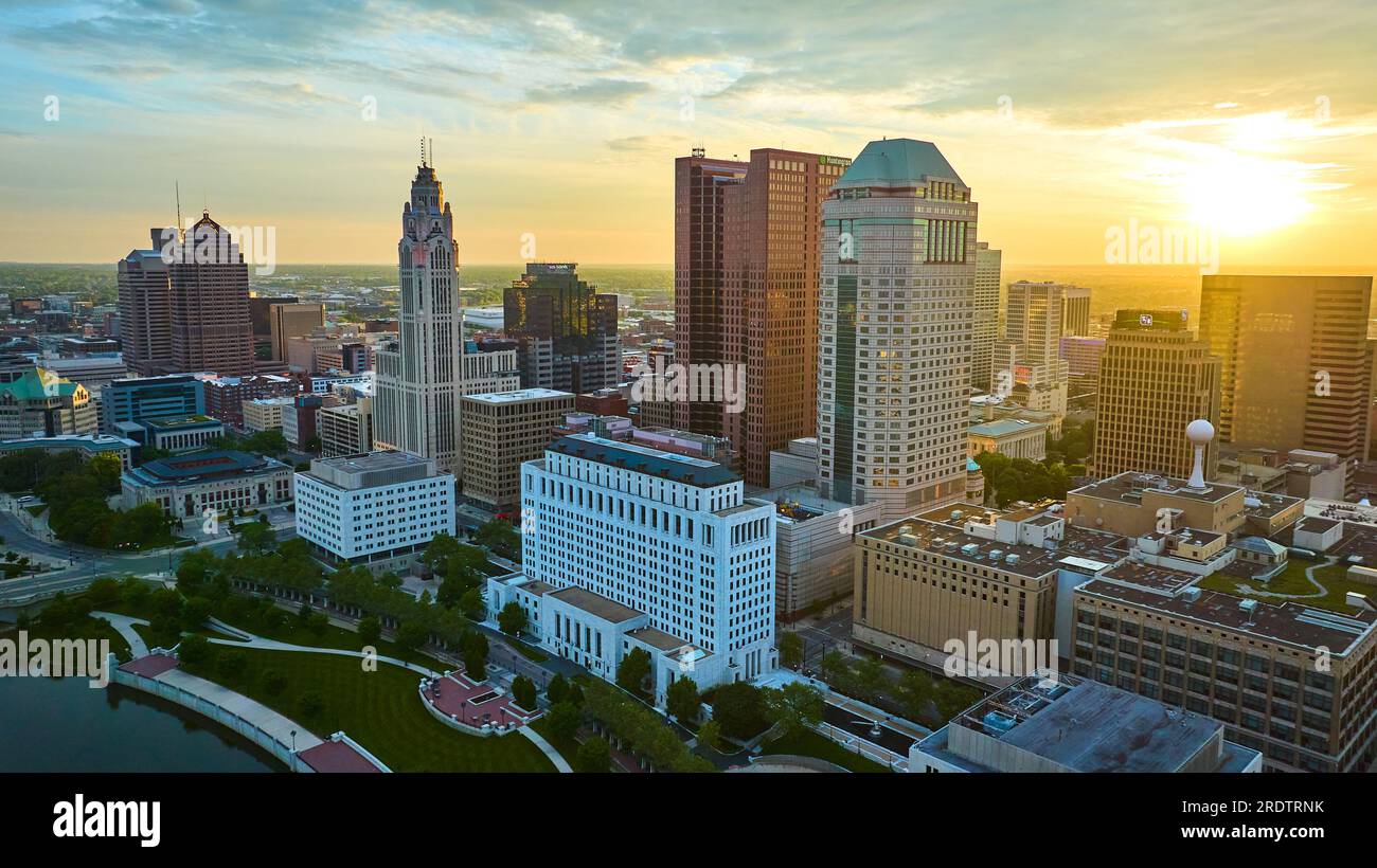 Golden glow of sunrise behind four iconic Columbus Ohio skyscrapers ...