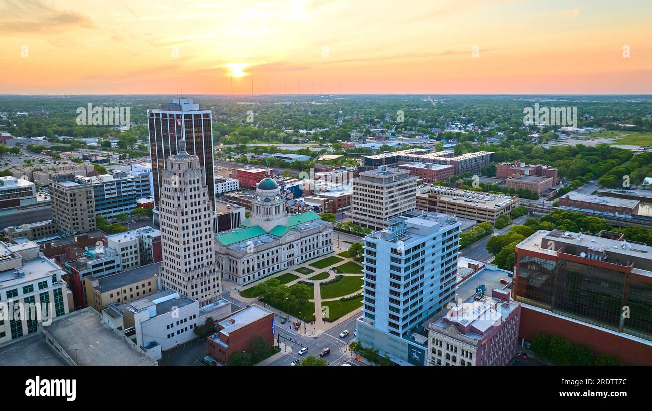 Aerial orange sunrise over downtown Fort Wayne main skyscrapers and ...