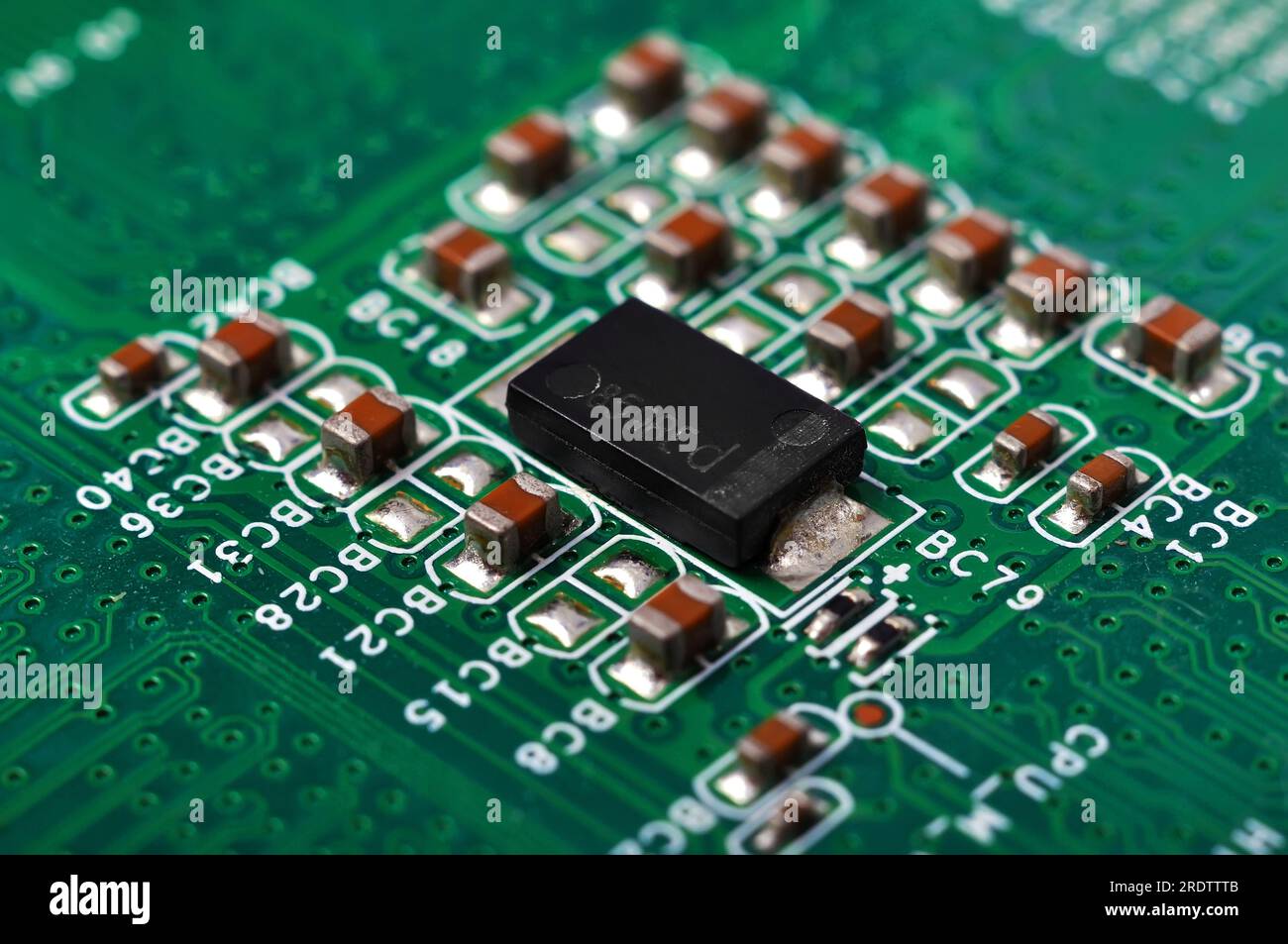 Microchips and circuit, close up Stock Photo - Alamy