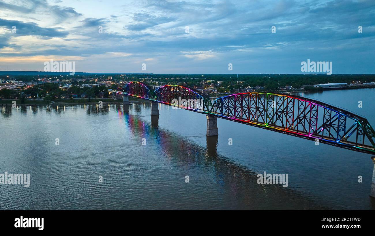 Silver blue sunset over arch bridge aerial rainbow pride illuminated at ...